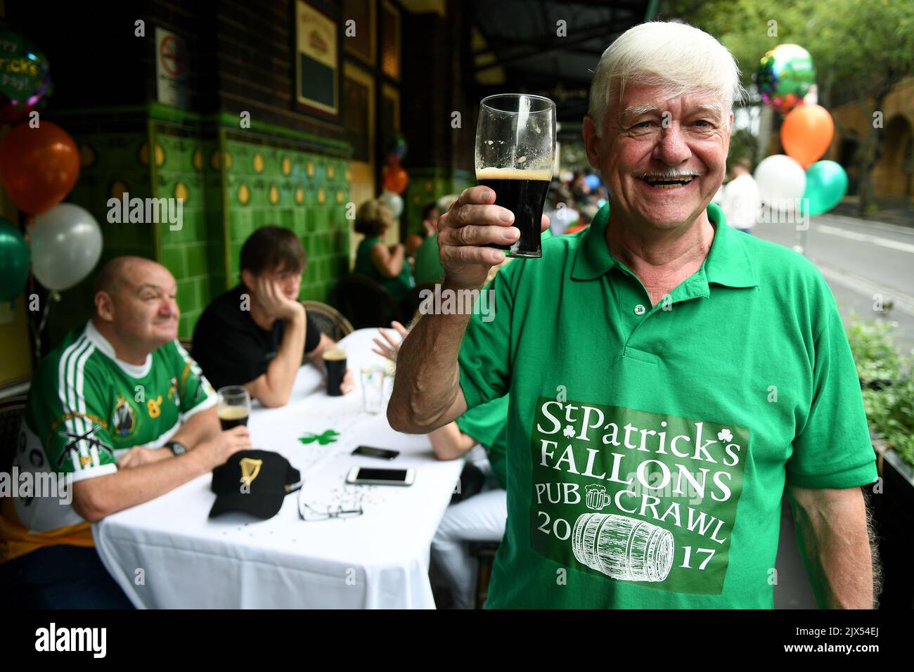 Joe Fallon poses for a photograph as he celebrates St Patrick's Day at ...