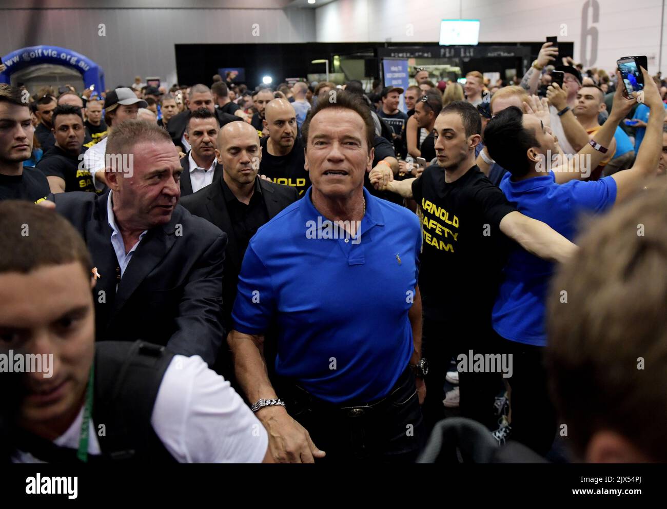 American actor Arnold Schwarzenegger walks through the crowd at the ...