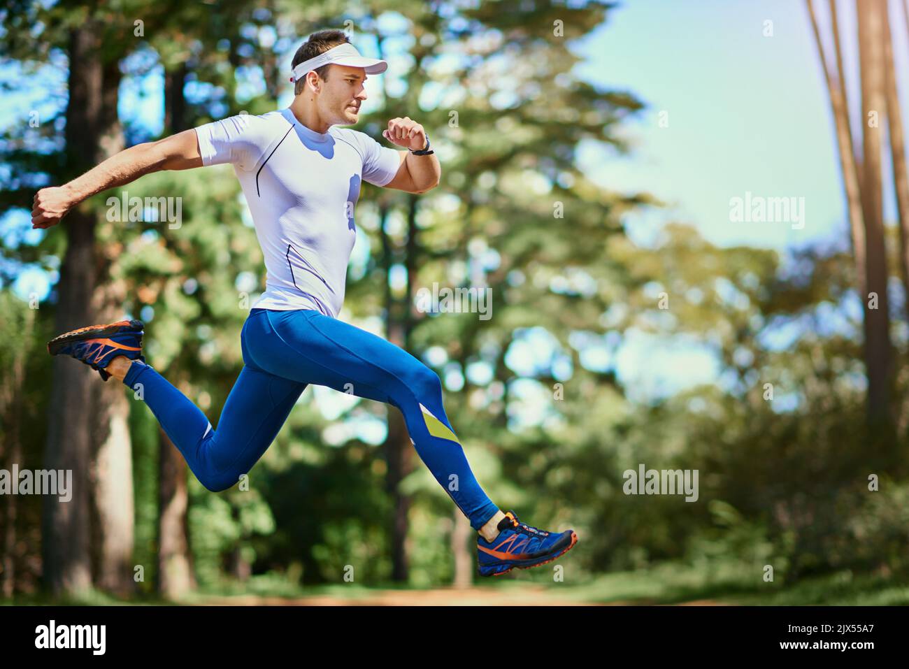 When your legs get tired, run with your heart. a young man running ...