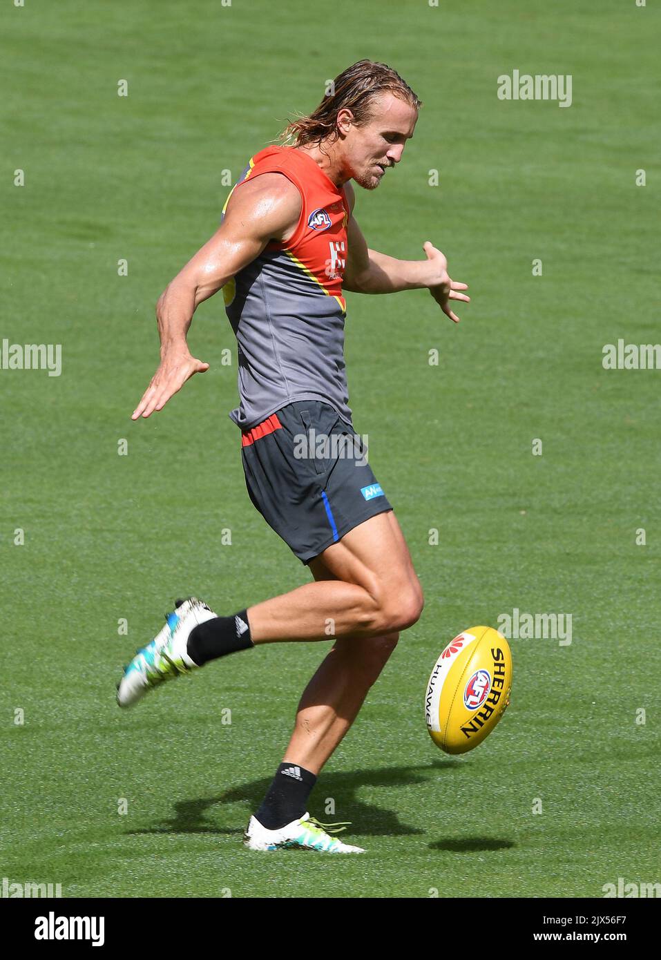 Matt Shaw kicks during the Gold Coast Suns training session at Metricon ...