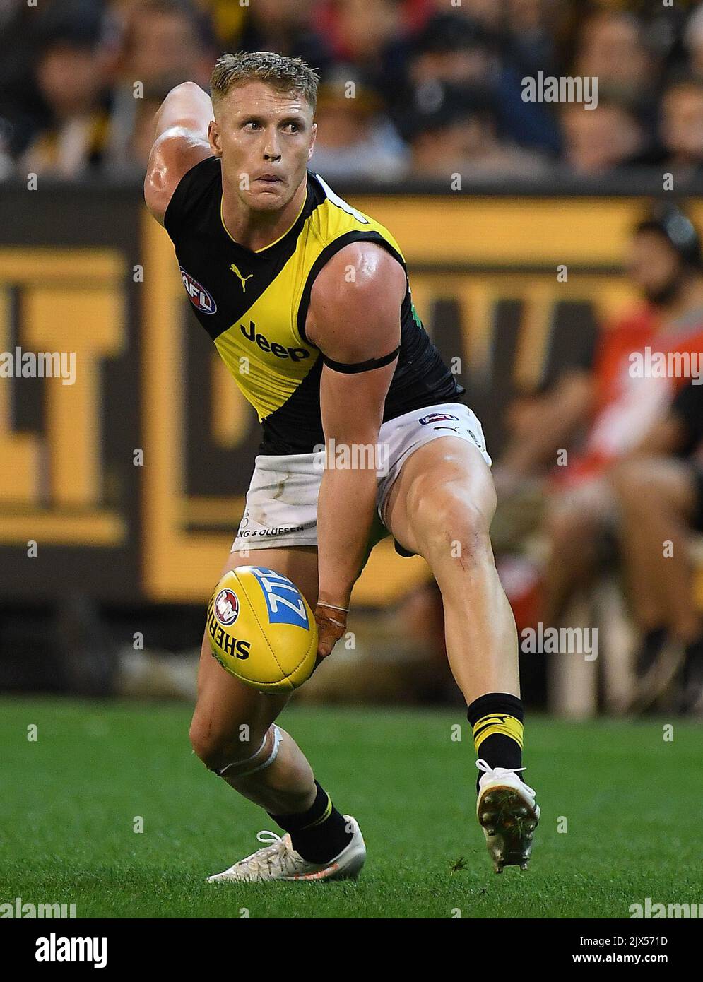 Josh Caddy of the Tigers is seen in action during the Round 1 AFL match ...