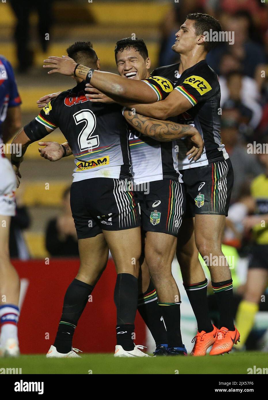 Dean Whare of the Panthers scores and celebrates with Nathan Cleary and ...