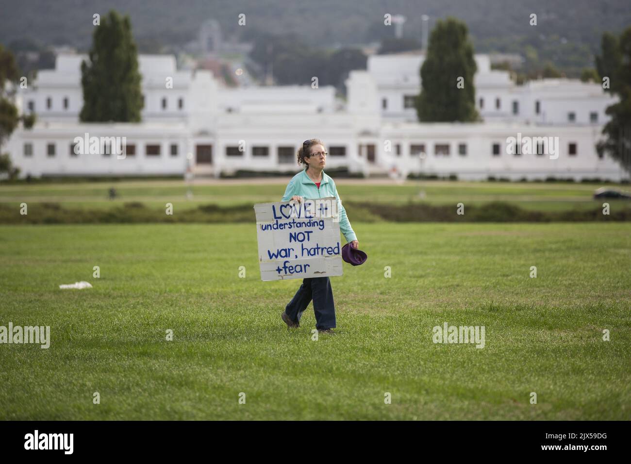 Gillian King arrives at a protest condemning Australia's absence at ...