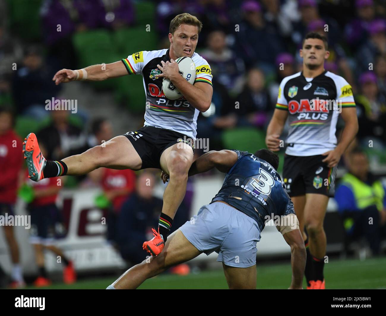 Matthew Moylan of the Panthers (left) and Jesse Bromwich of the Storm ...
