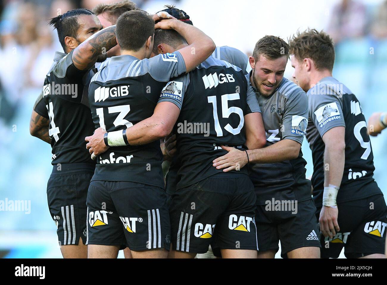 David Havili , (centre), celebrates with team mates after scoring a try ...