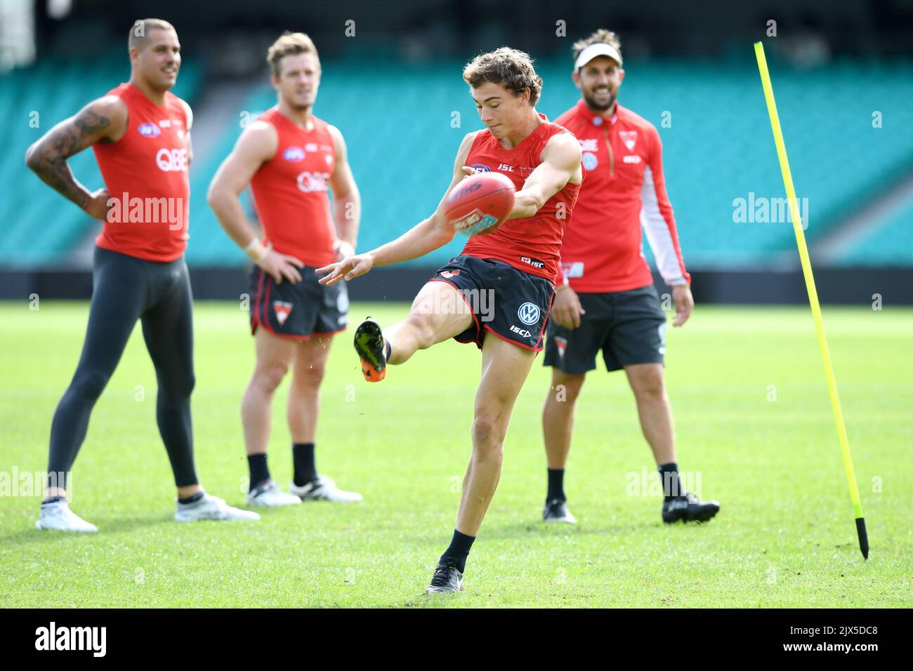 Sydney Swans AFL player Will Hayward (centre) takes part in a training ...