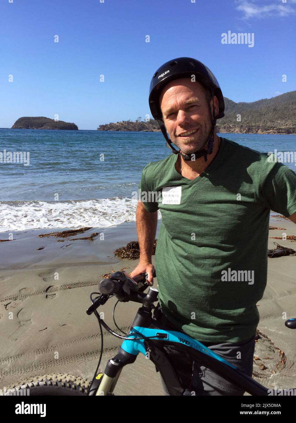 Ben Rea stands with his bike during the launch of Tasmanian E-Bike ...