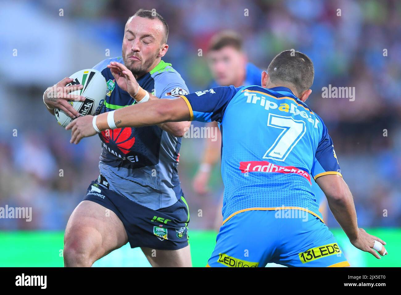 Josh Hodgson of the Raiders takes on the defence during the Round 6 NRL ...