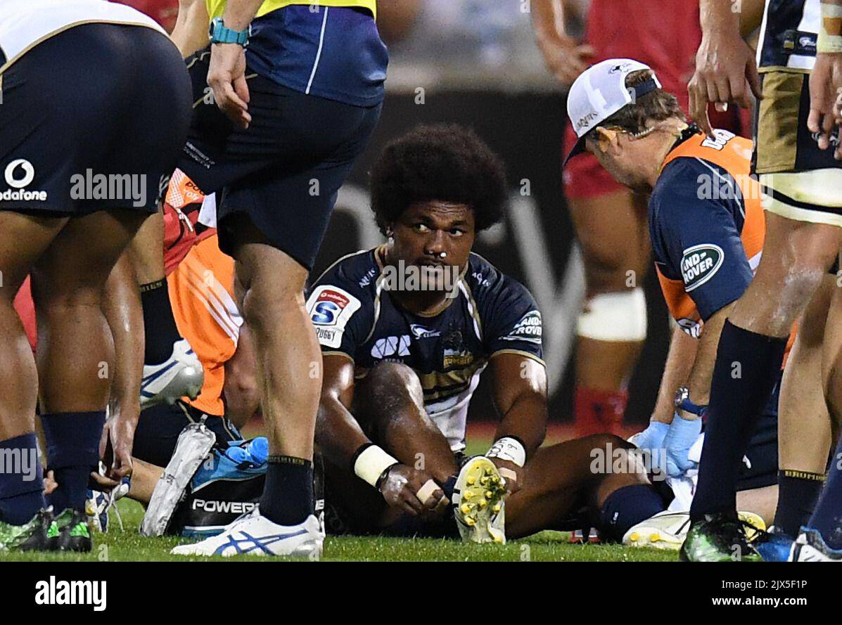Henry Speight of the Brumbies is attended to by a team doctor during ...