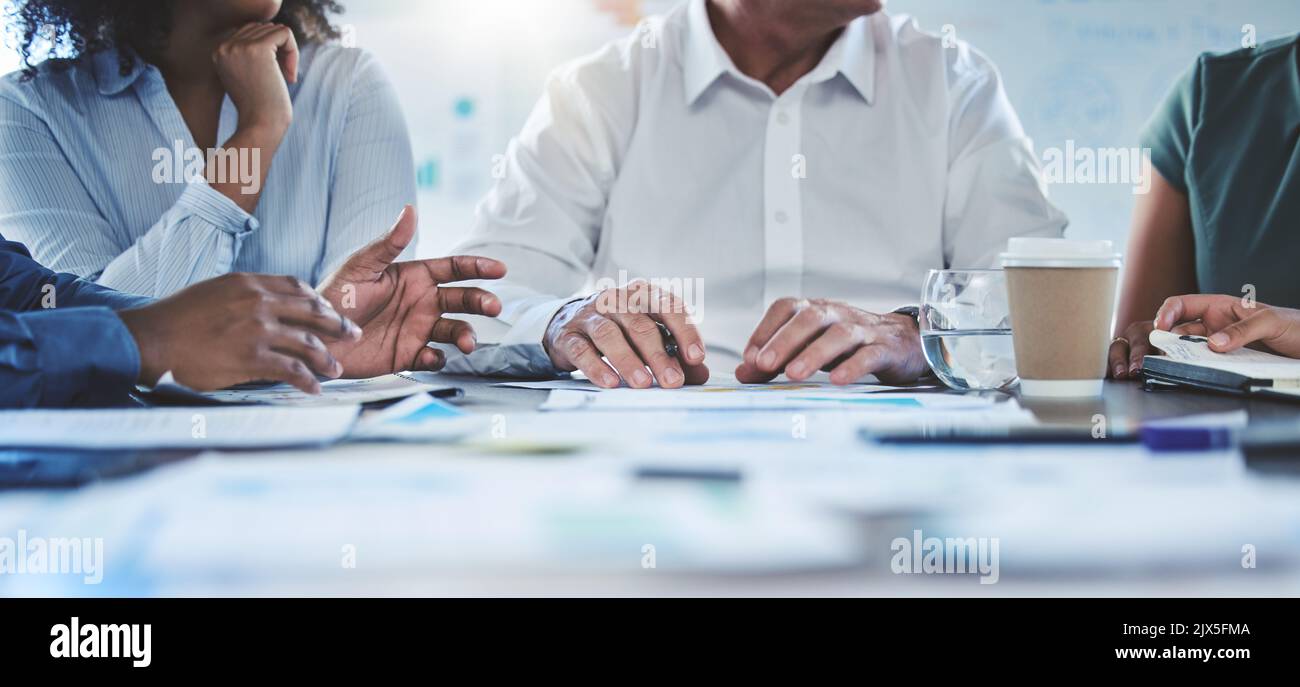 Hands, teamwork and collaboration with a team of business people in a ...