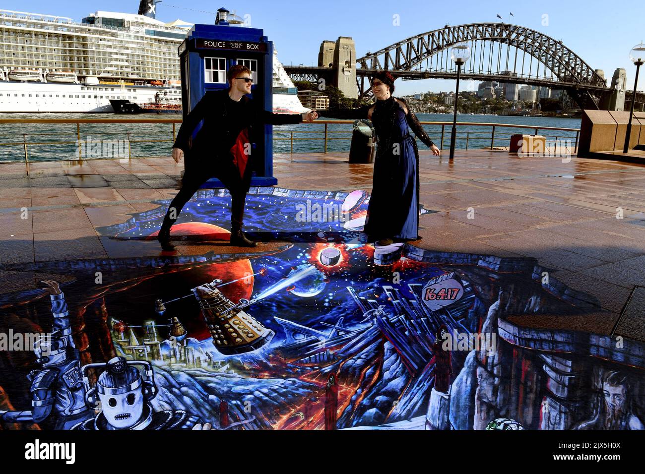 Dr. Who fans dressed up as Dr. Who characters pose for photographs set ...