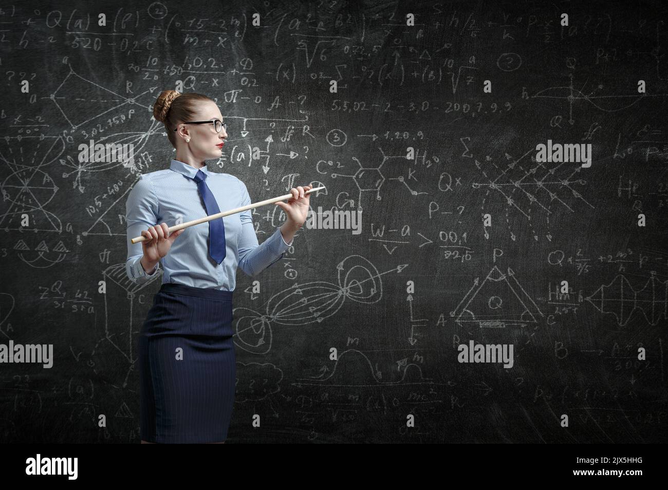 Strict female teacher . Mixed media Stock Photo - Alamy