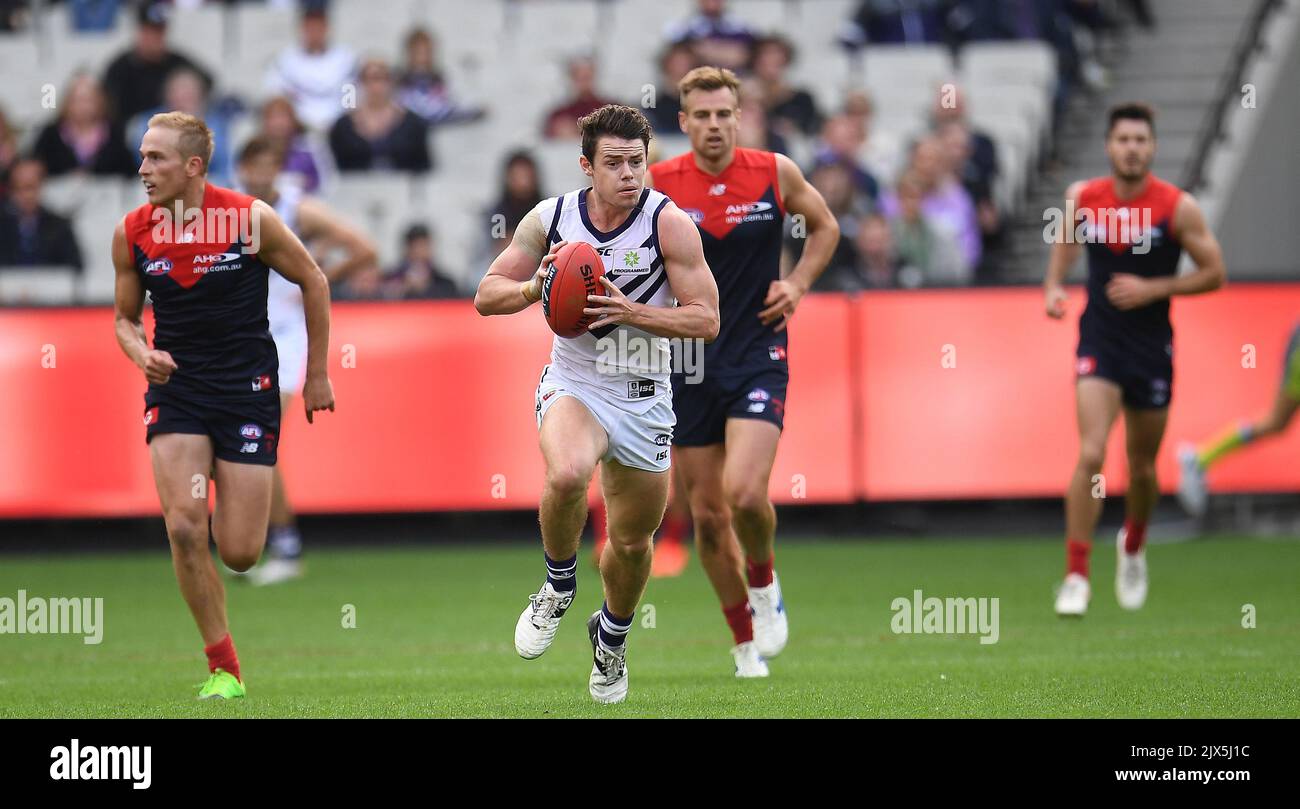 Lachie Neale of the Dockers (second from left) is seen in action during ...