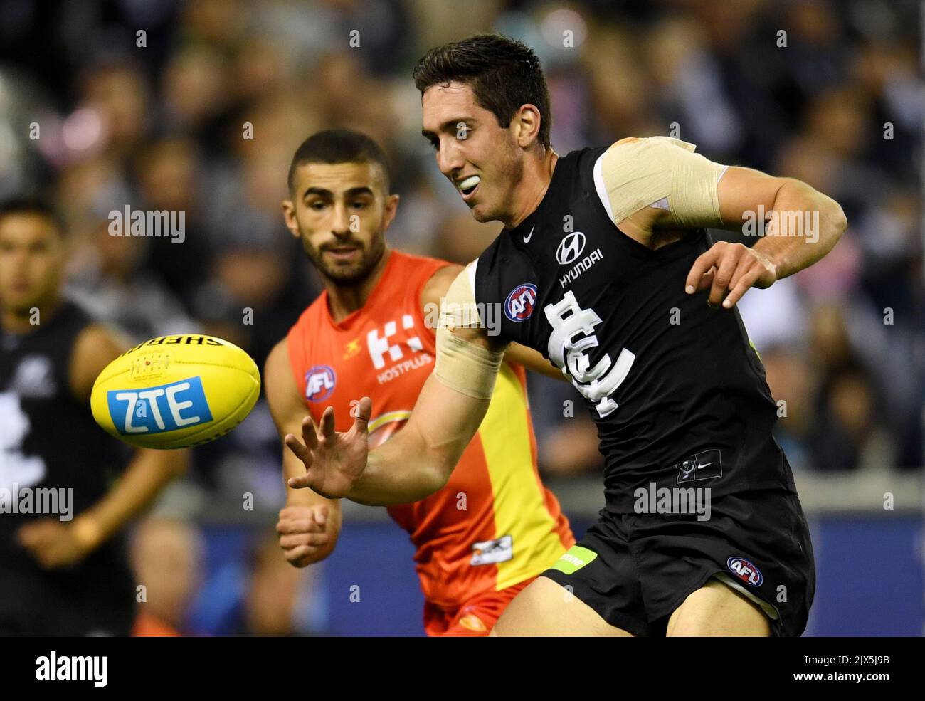 Jacob Weitering of the Blues and Adam Saad of the Suns during the ...
