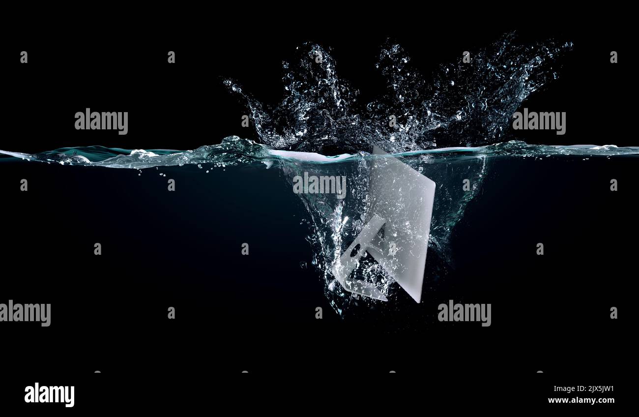 Keyboard dropped into water . Mixed media Stock Photo - Alamy