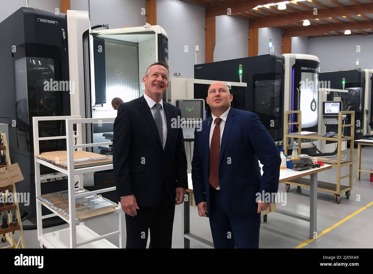 Queensland Treasurer Curtis Pitt (right) touring the Ferra ...
