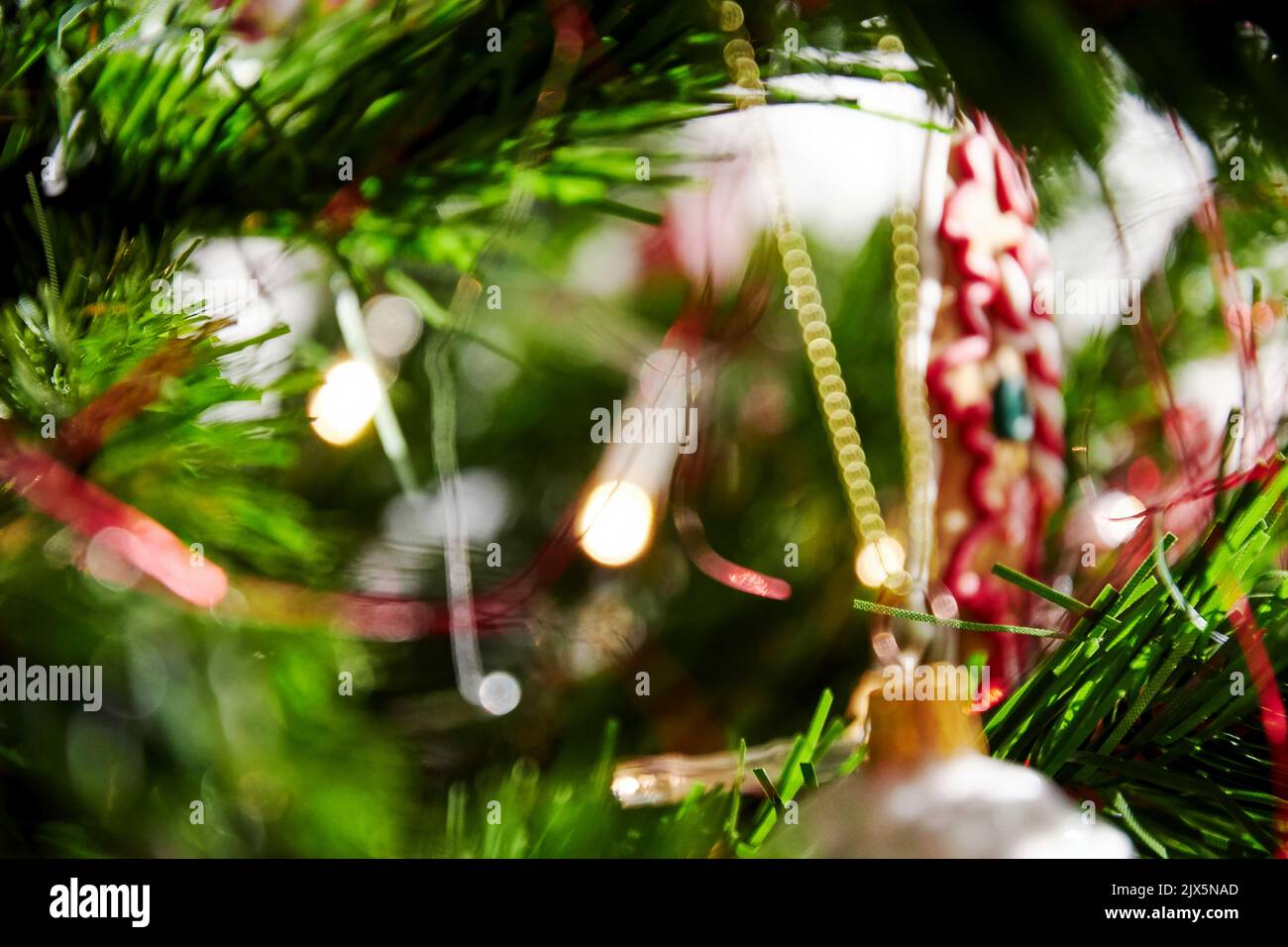 Abstract blurred Christmas background with ribbons, garland and shiny ...