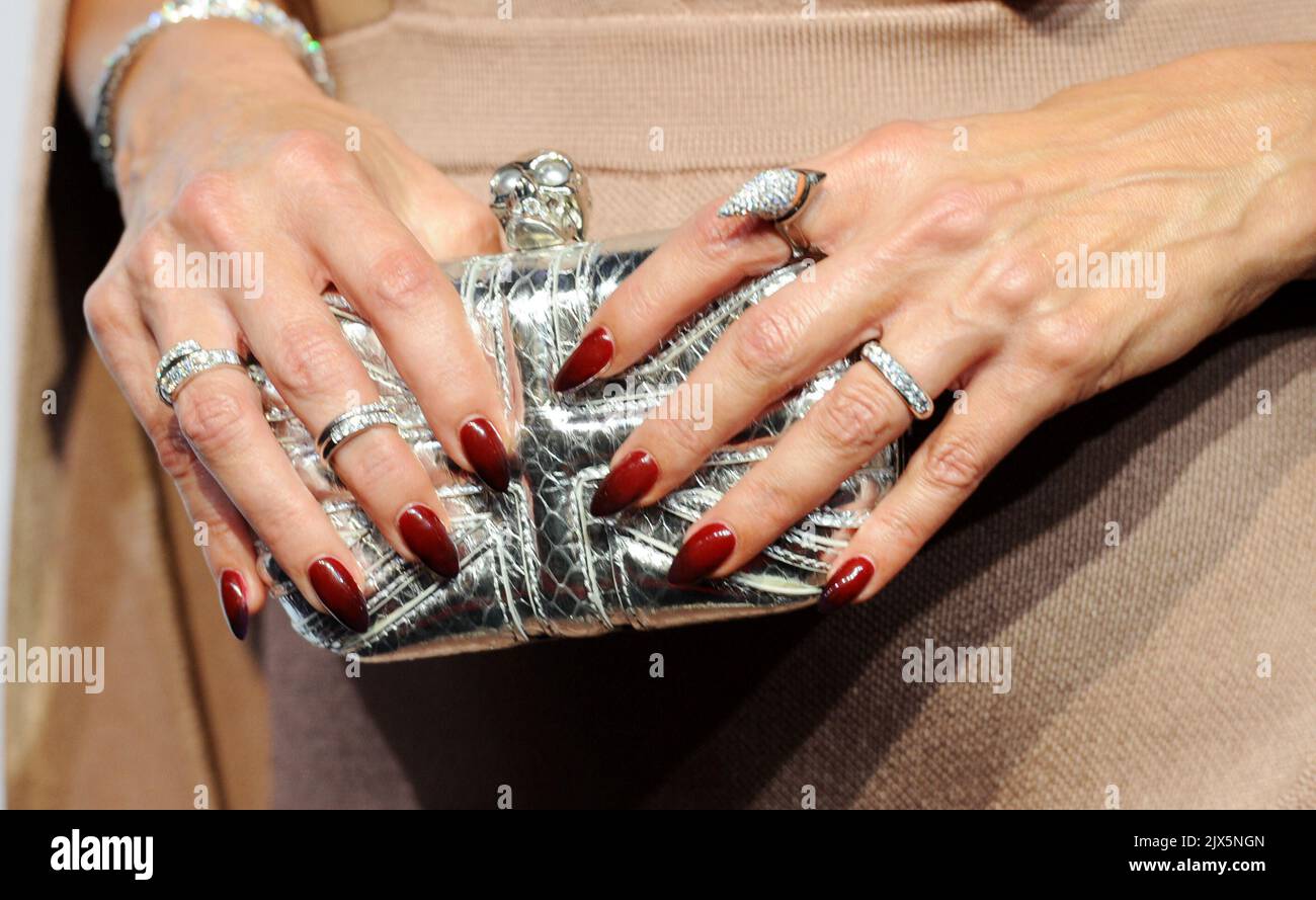 Sonia Kruger clutches her handbag as she arrives at the 2017 Logie ...