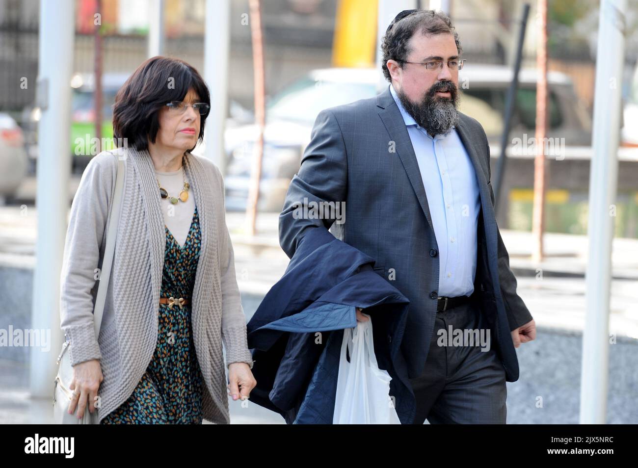 Businessman Joseph Gutnick's wife Stera Gutnick, and son Mordechai walk ...
