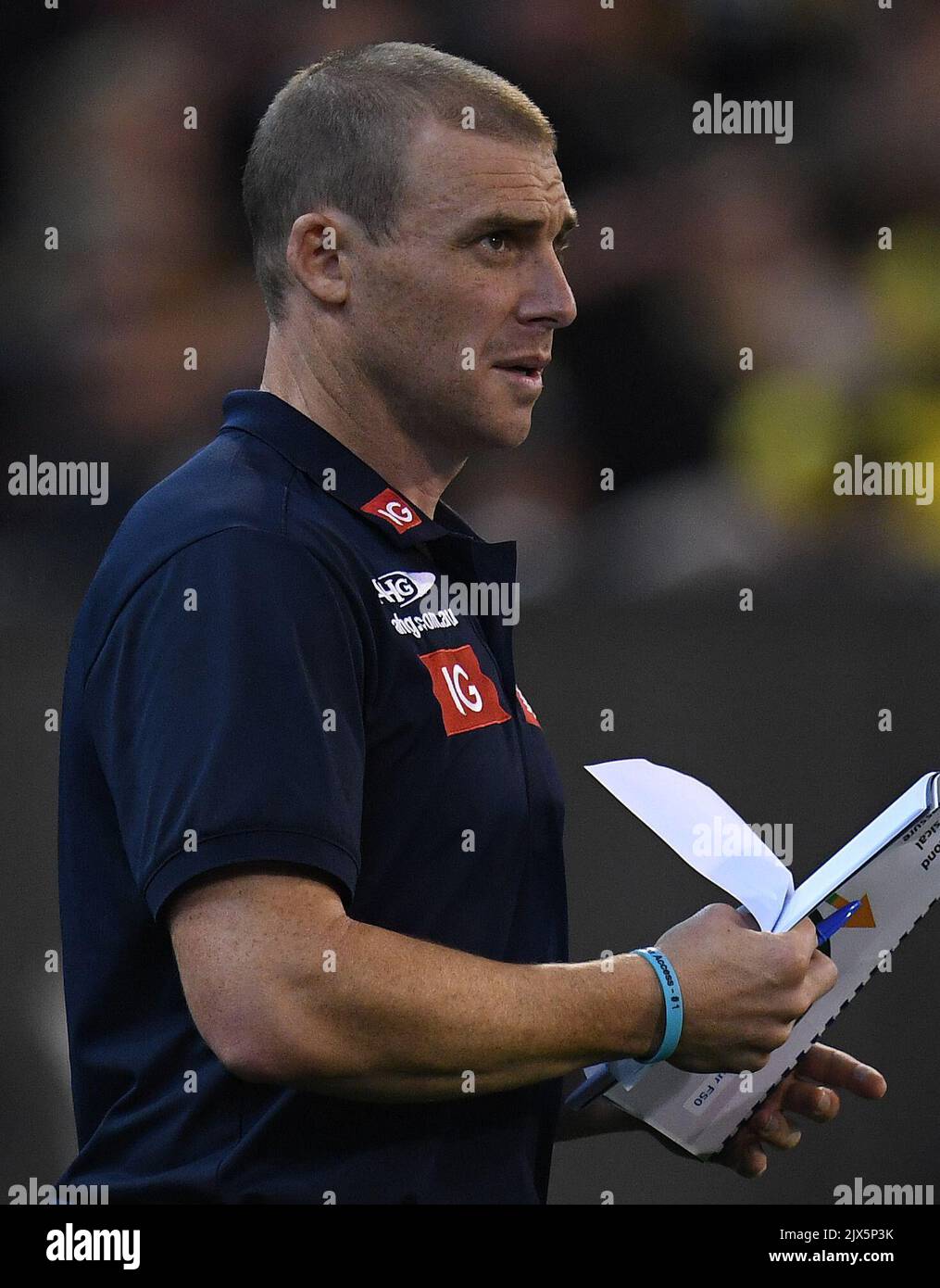 Coach of the Demons Simon Goodwin is seen during the Round 5 AFL match ...