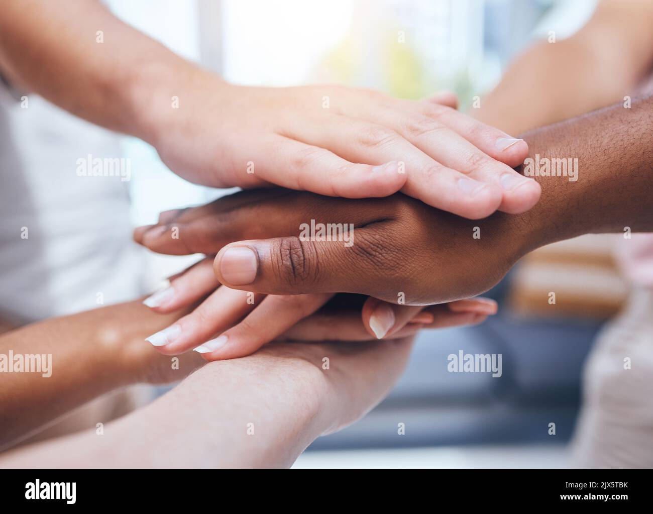 Hands, teamwork and support with a team of people working together in ...