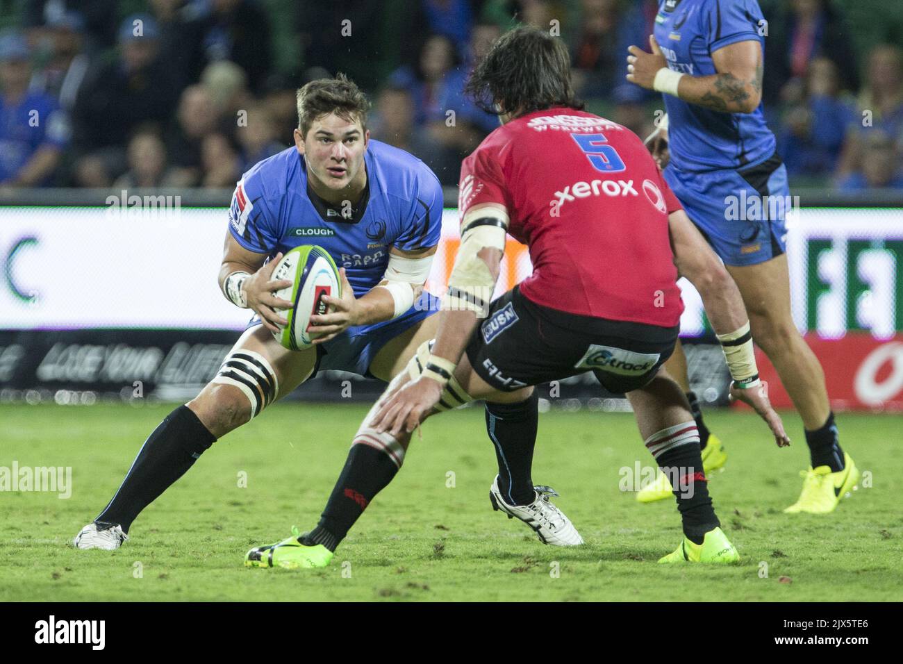 Richard Hardwick of the Force takes on Franco Mostert of the Lions ...