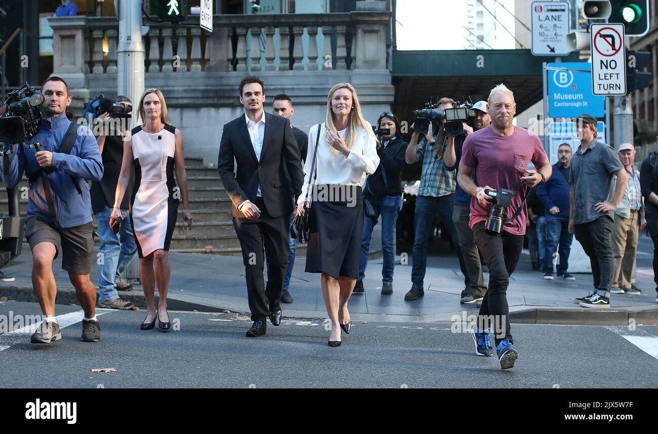 Kelly Landry (centre) crosses the road after leaving the Downing Centre ...