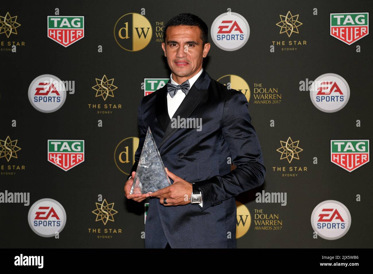 A-League player Tim Cahill poses with the Goal of the Year Award at the ...