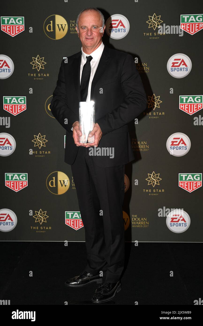 A-League coach Graham Arnold poses with the Coach of the Year Award at ...