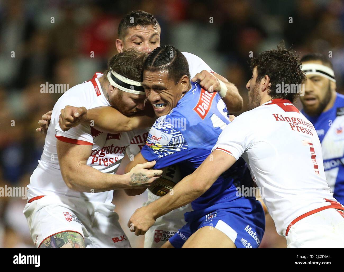Chris McQueen of England tackles Sauaso Sue of Samoa during the Pacific ...