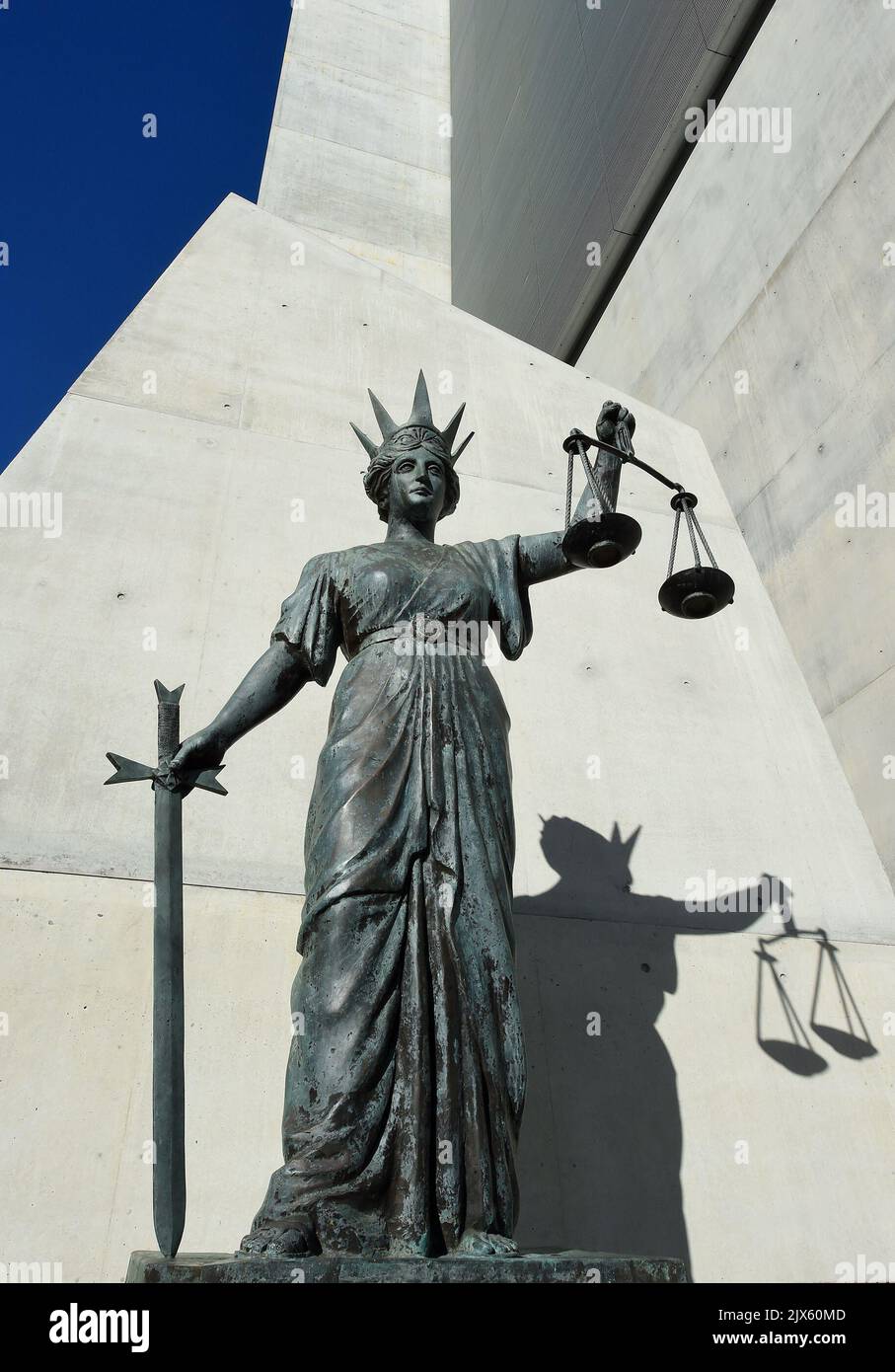 A statue of Themis, the Greek God of Justice stands outside the Supreme ...