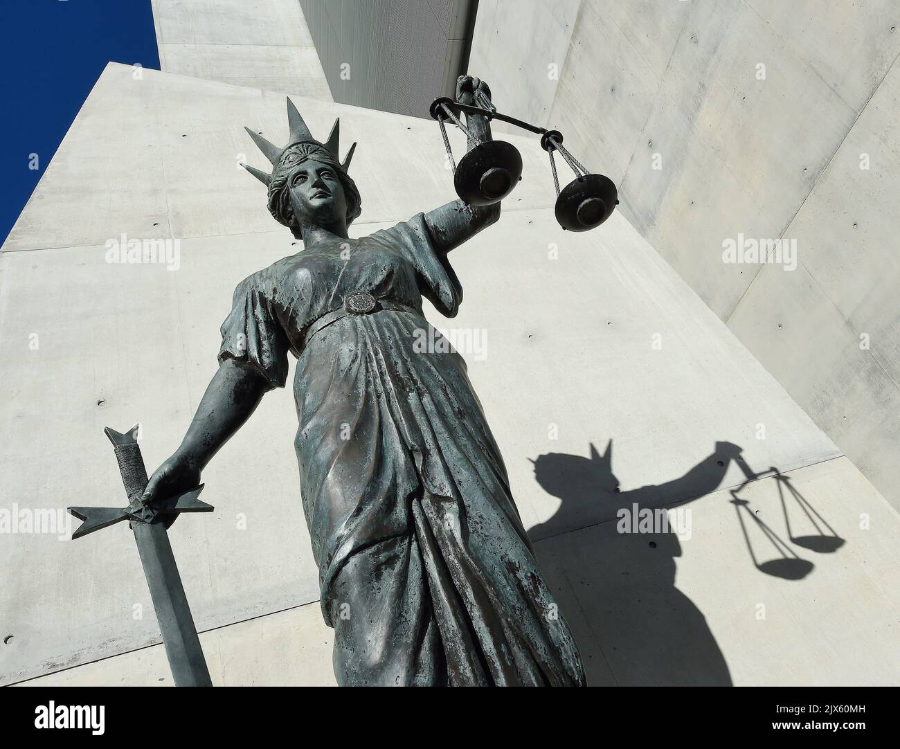 A statue of Themis, the Greek God of Justice stands outside the Supreme ...