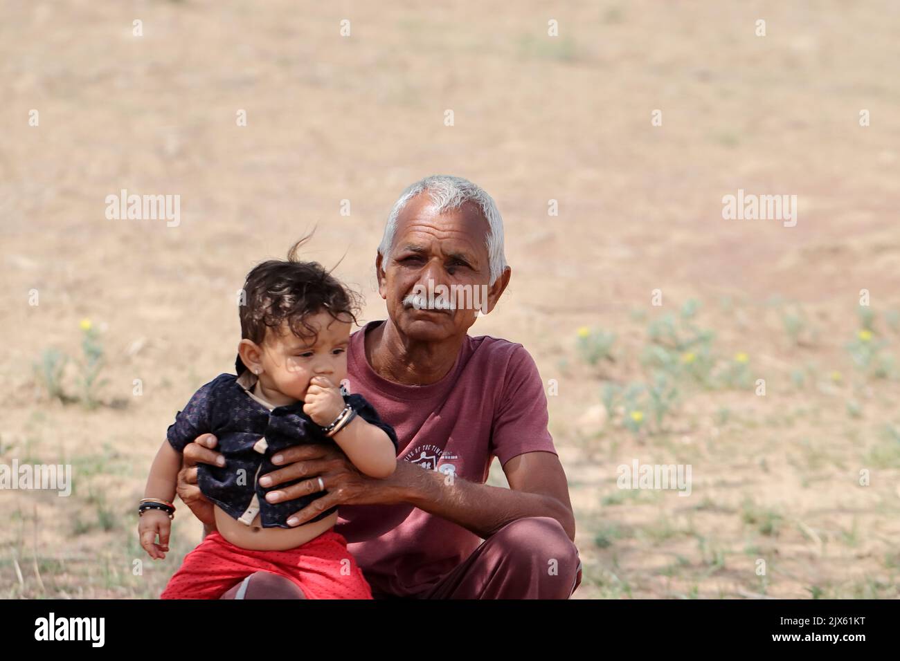 Close-up photo of indian Senior grandfather and hindu little grandson ...