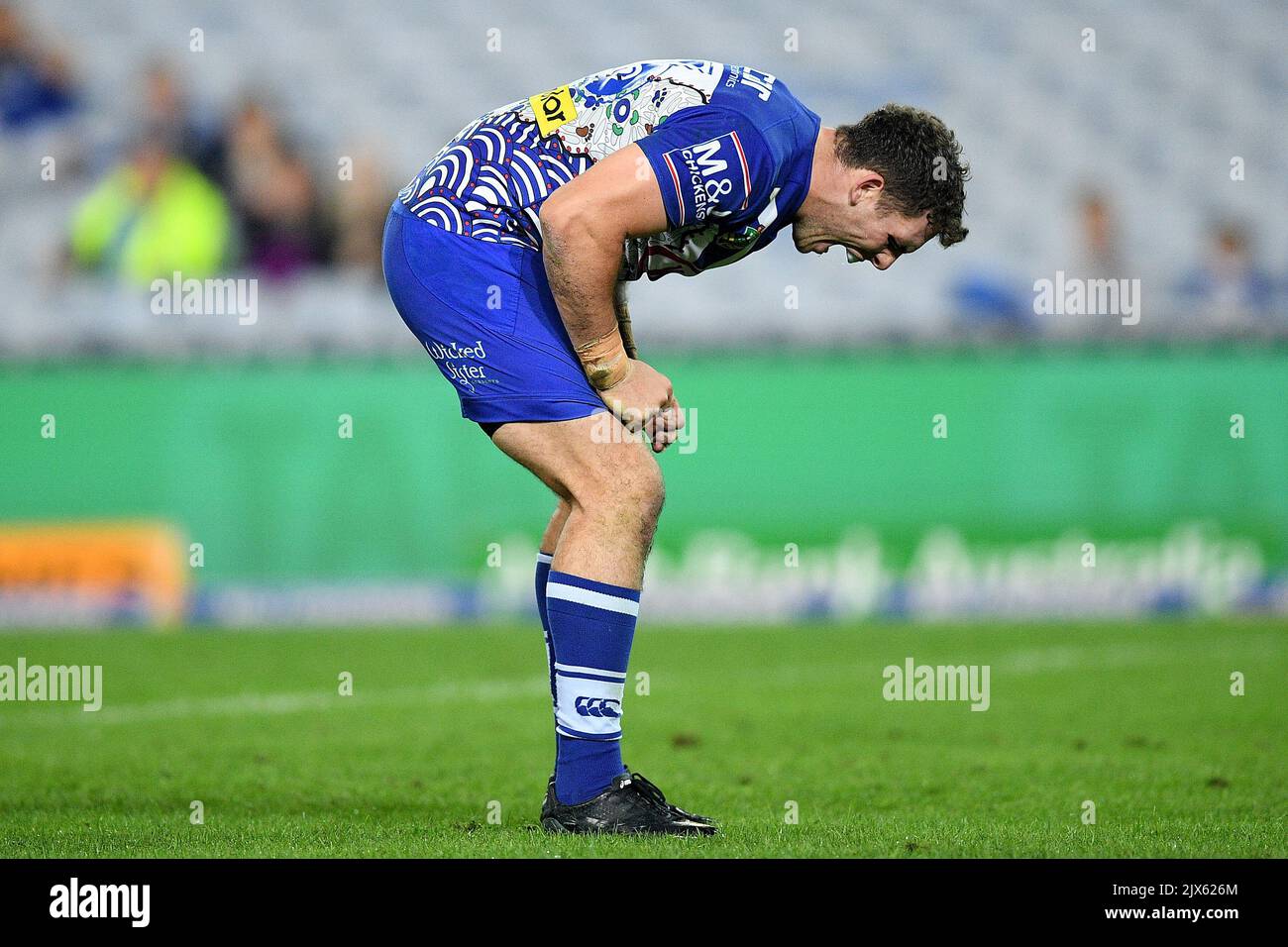 Adam Elliot of the Bulldogs reacts during the Round 10 NRL match ...