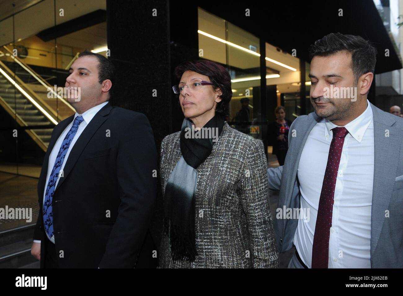 Eman Sharobeem (centre) departs after giving evidence at the NSW ...