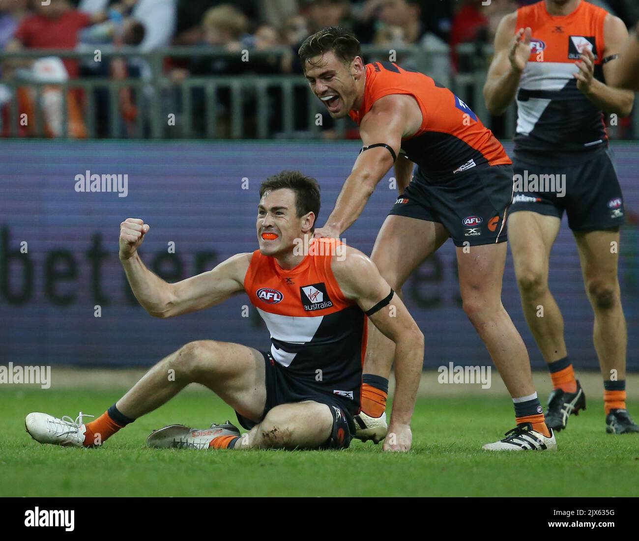 Jeremy Cameron (left) of the Giants celebrates scoring during the Round ...