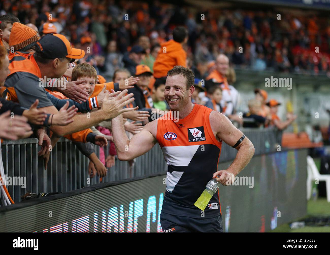 Steve Johnson (centre) of the Greater Western Sydney (GWS) Giants ...