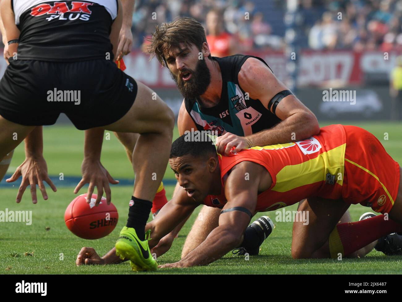Justin Westhoff of Port Adelaide Power tackles Touk Miller of the Gold ...