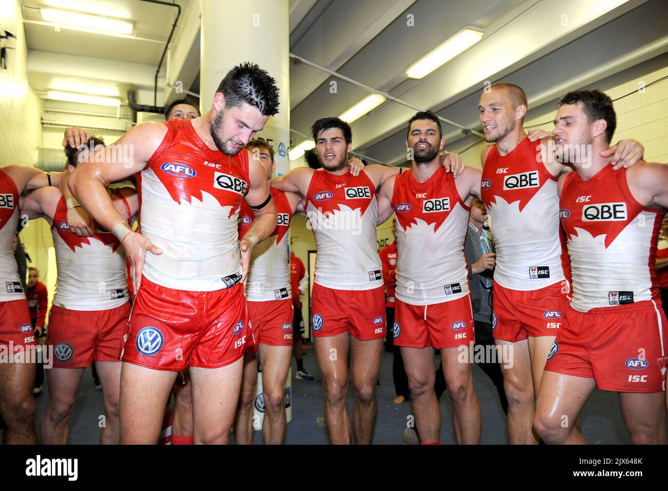 Nic Newman of the Swans celebrates with team-mates after the side's win ...