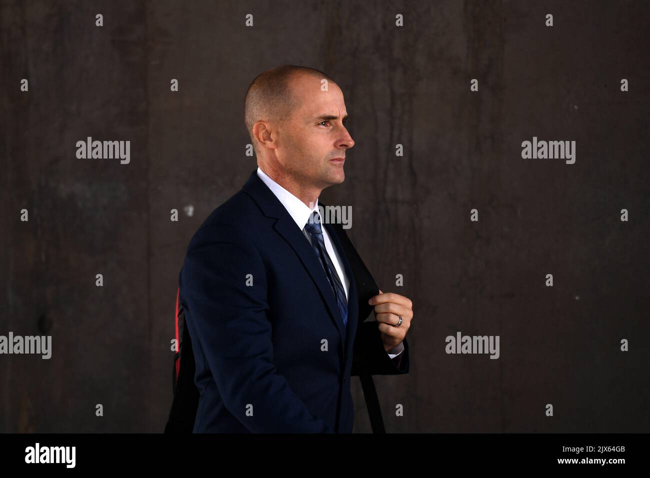 Dog Squad officer Robert Richardson leaves the Magistrates Court in ...