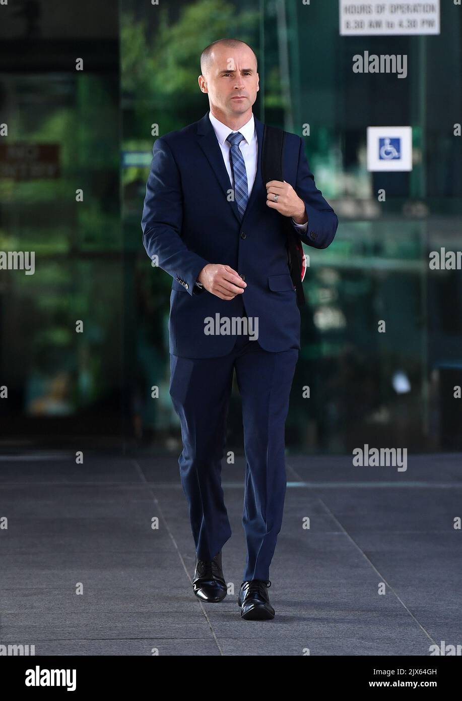 Dog Squad officer Robert Richardson leaves the Magistrates Court in ...