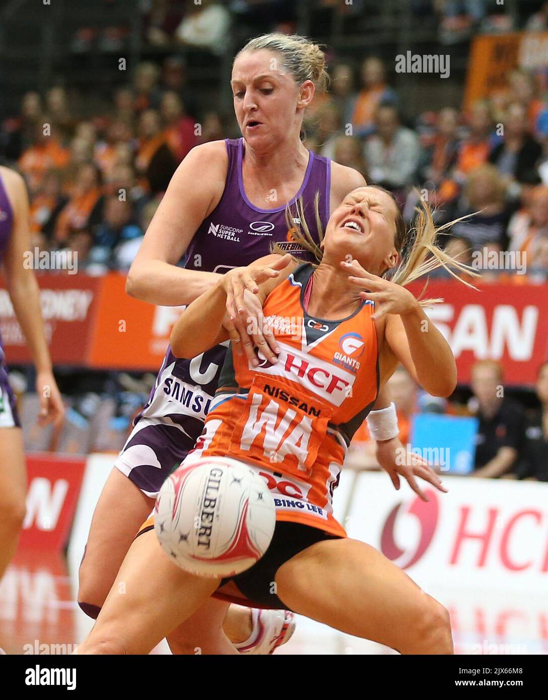 Sarah Wall of the Giants and Erin Burger of the firebirds contest the ...