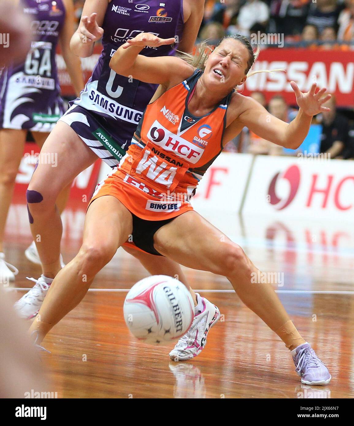 Sarah Wall of the Giants and Erin Burger of the firebirds contest the ...