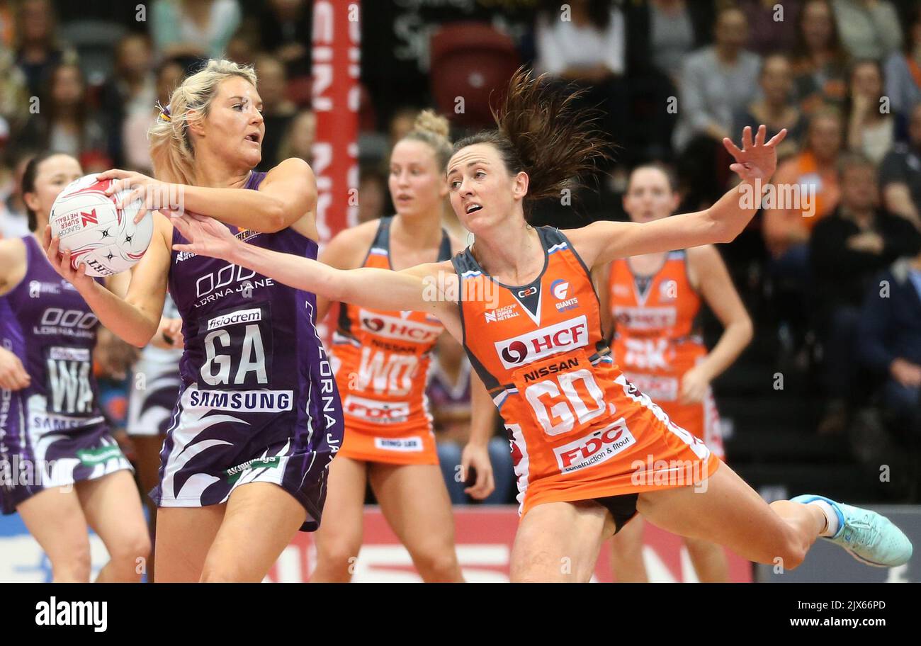 Gretel Tippett of the firebirds and Bec Bulley of the Giants contest ...
