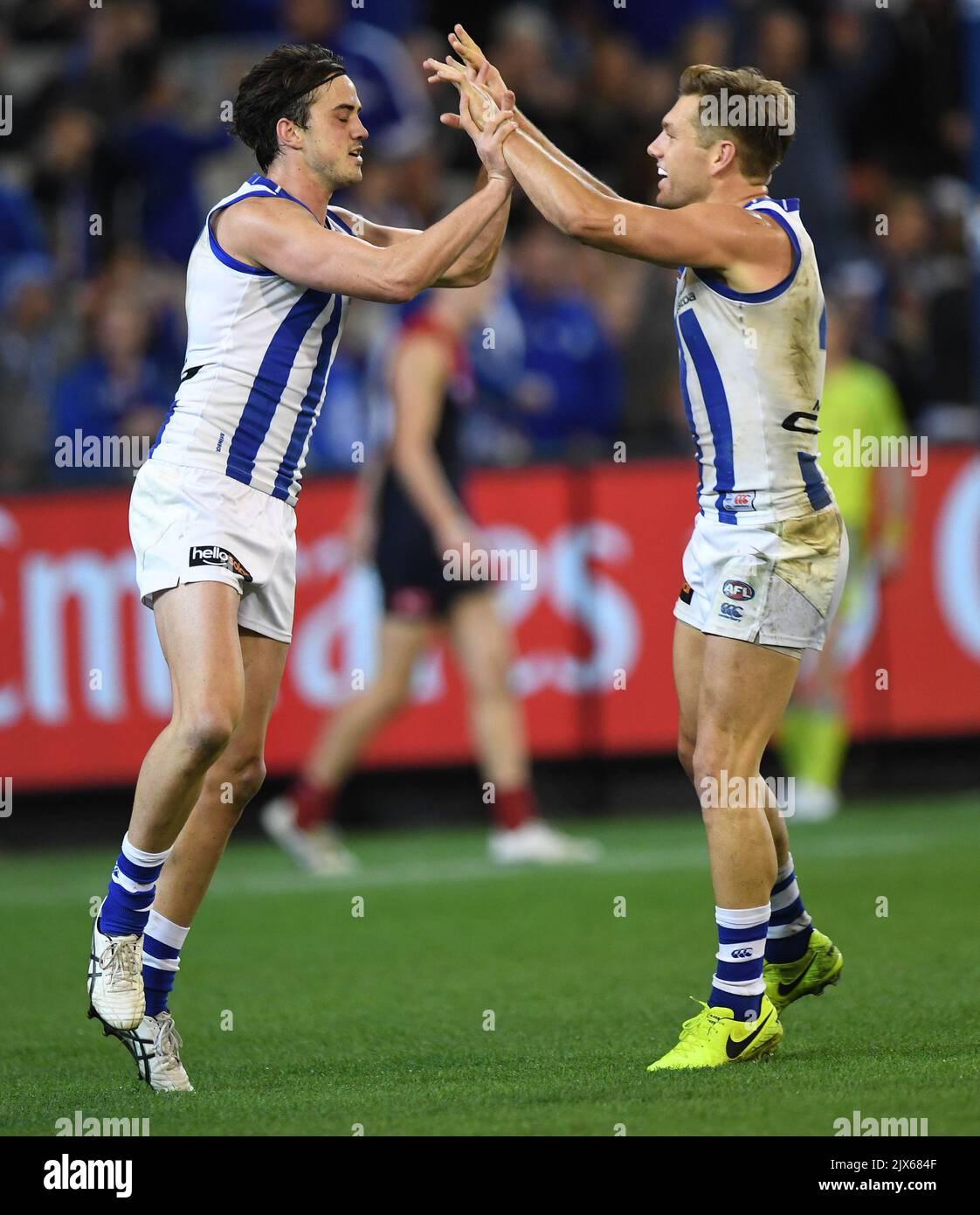 (L-R) Taylor Garner and Shaun Higgins of the Kangaroos react after ...