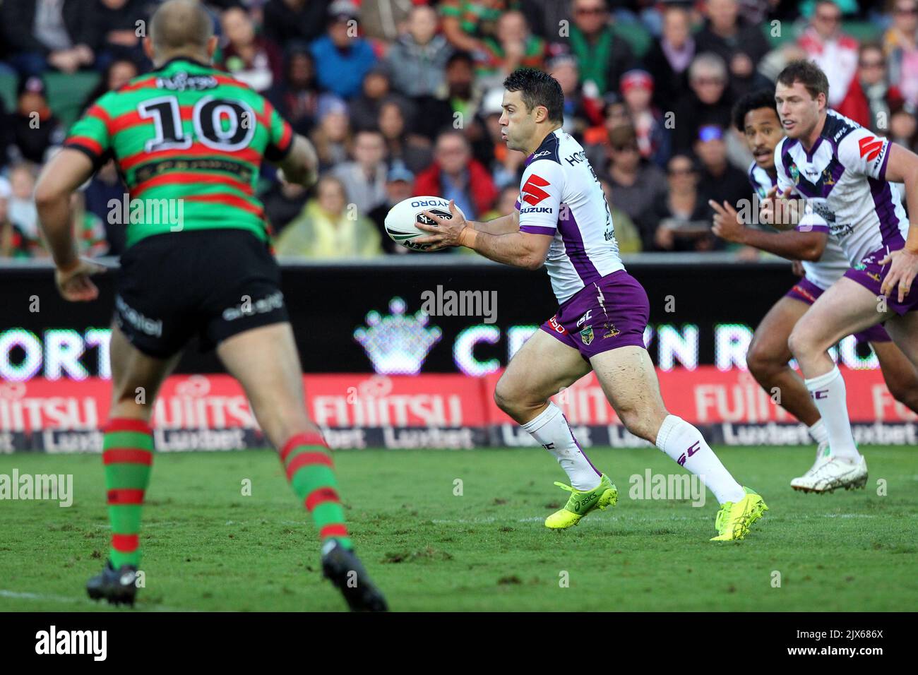 Cooper Cronk of the Storm runs the ball during the Round 11 NRL match ...