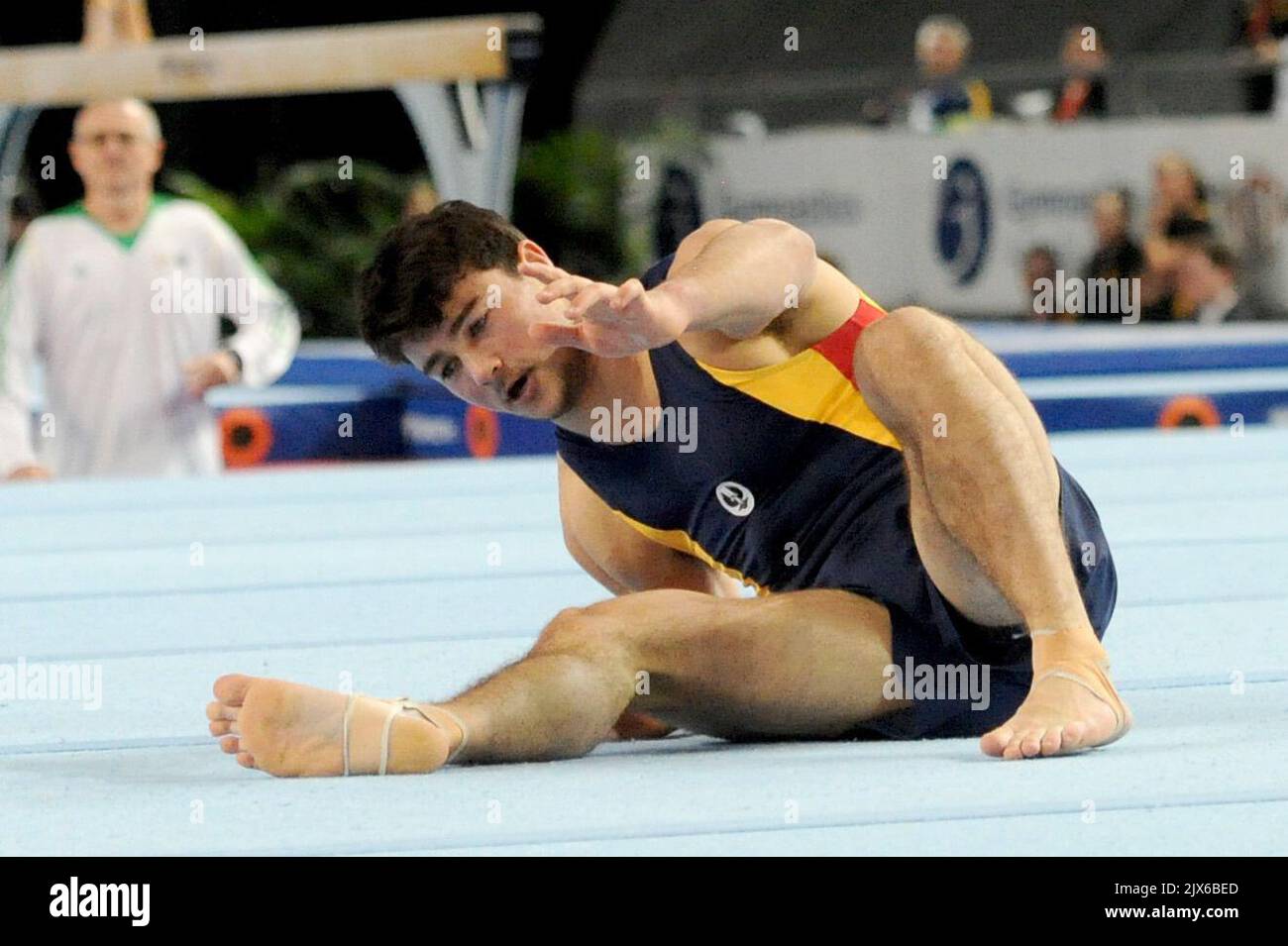 Clay Stephens of South Australia falls during his routine on the Floor ...