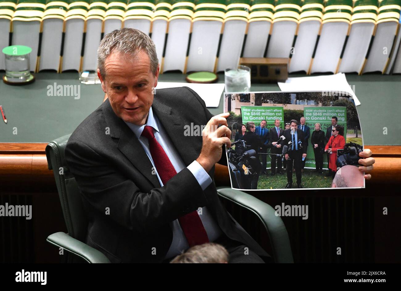 Leader of the Opposition Bill Shorten hold a prop during Question Time ...