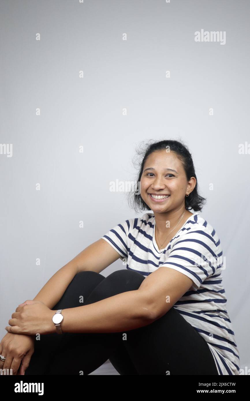 Smile woman happy in studio Stock Photo - Alamy
