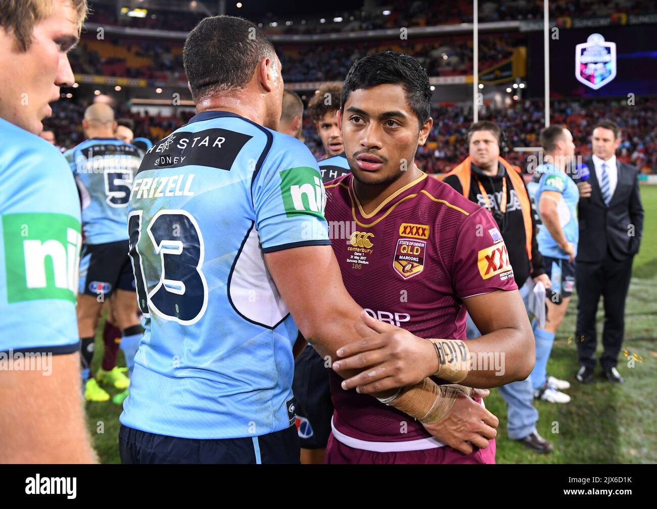 Anthony Milford of the Queensland Maroons (right) following Game 1 of ...